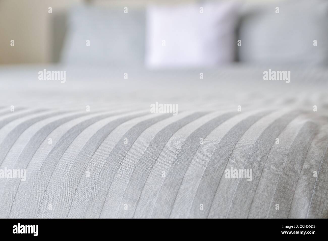 Clean sheet on bed, closeup Stock Photo - Alamy
