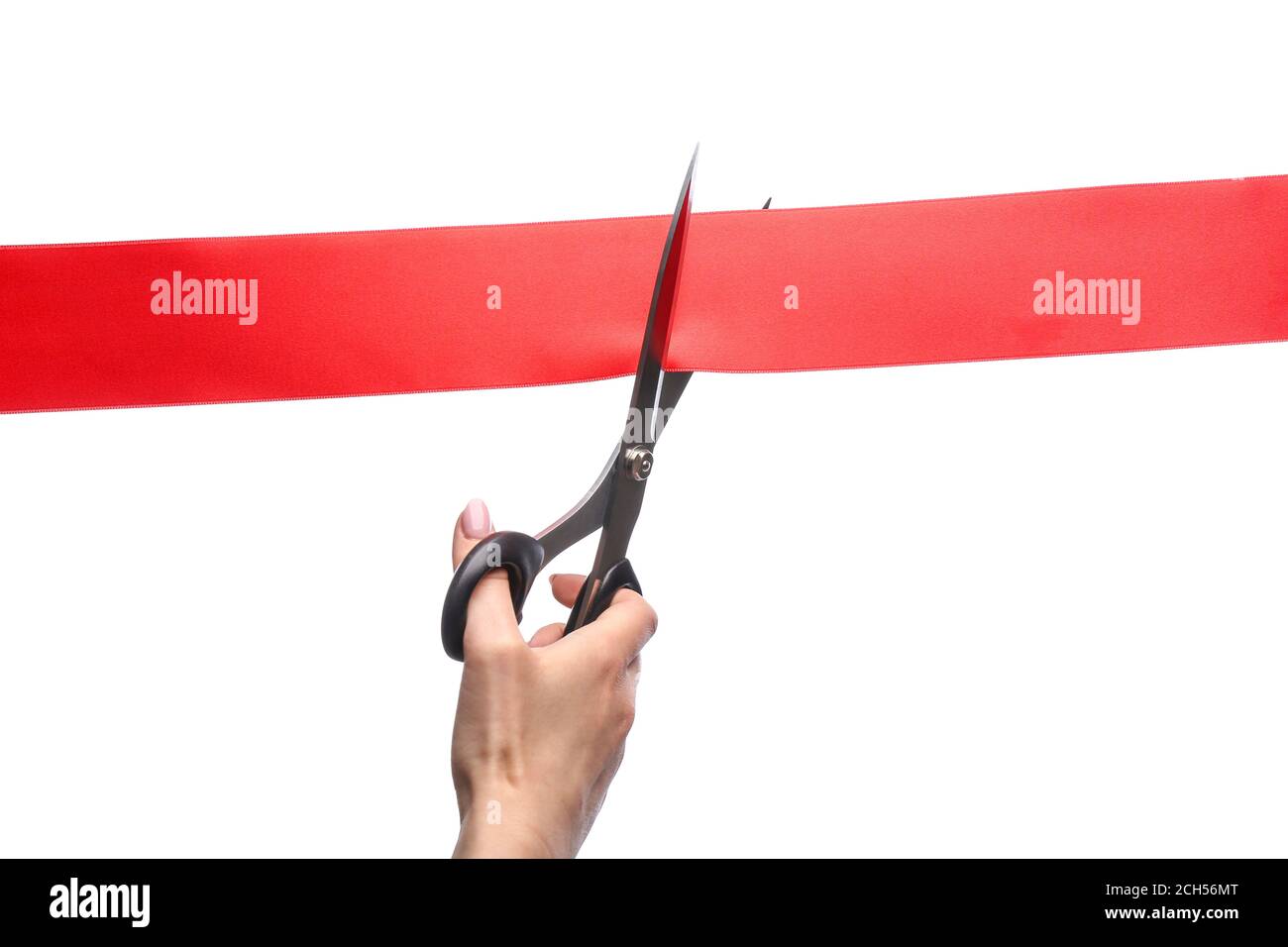 Woman cutting red ribbon on white background Stock Photo - Alamy