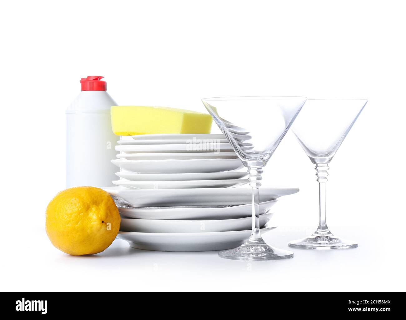 Clean tableware with sponge and detergent on white background Stock ...