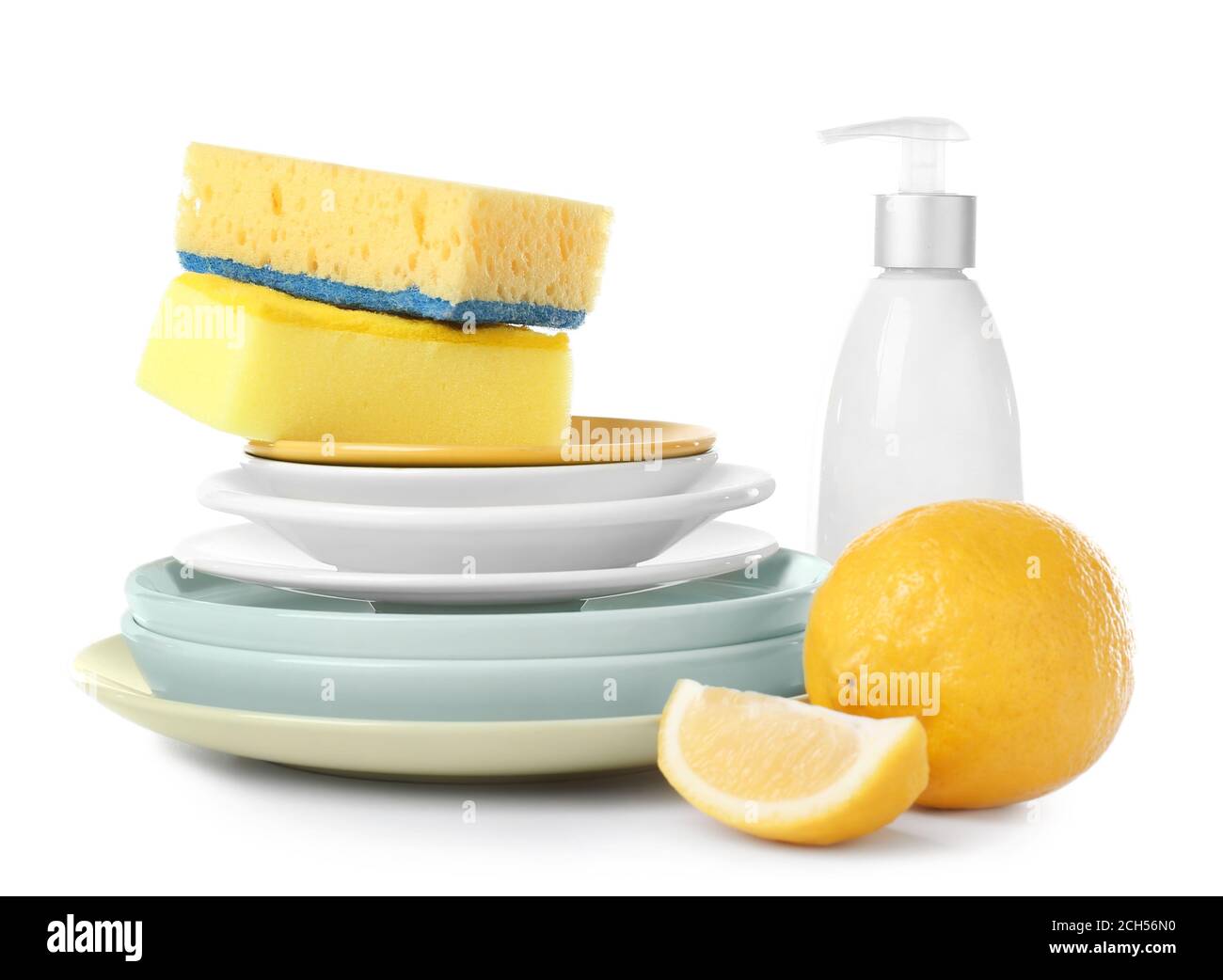 Clean tableware with sponges and detergent on white background Stock ...