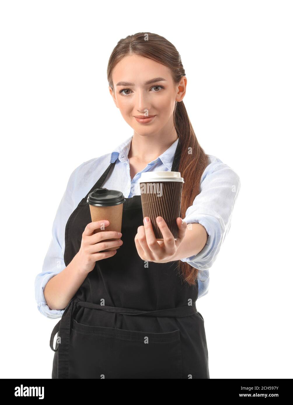 Young female barista on white background Stock Photo - Alamy