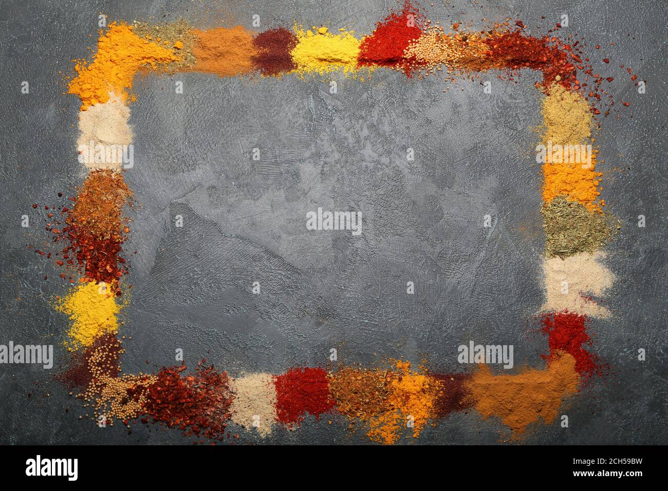 Frame made of different spices on table Stock Photo - Alamy
