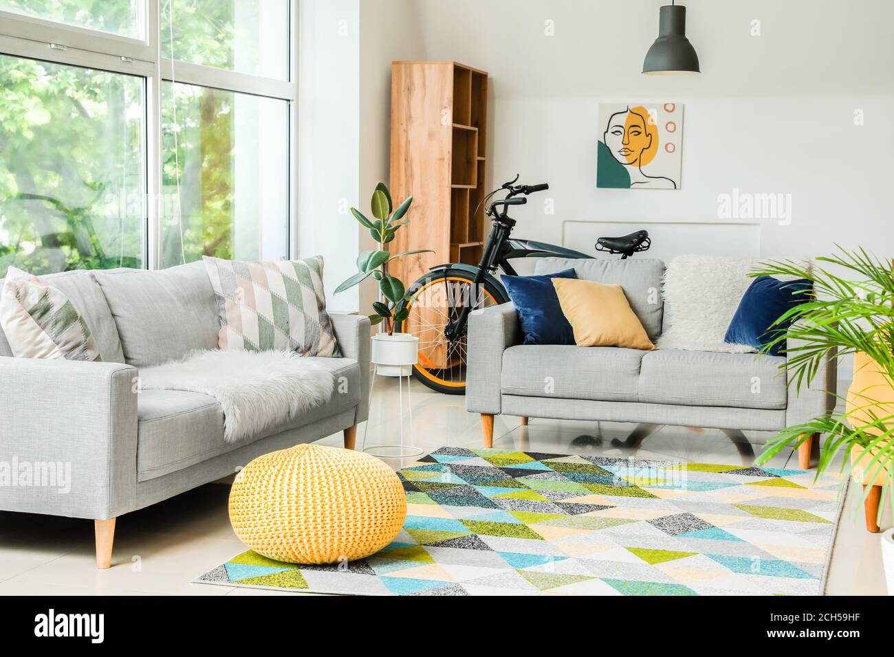 Stylish interior of living room with comfortable sofas Stock Photo - Alamy