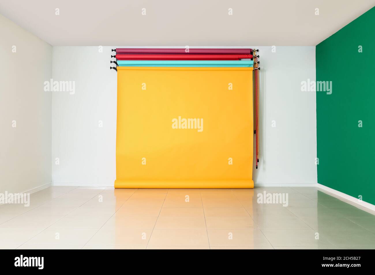 Color backdrops in modern photo studio Stock Photo - Alamy