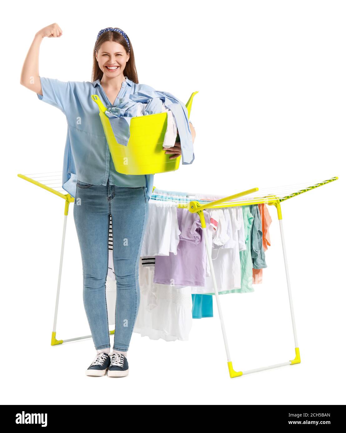 Woman with clean clothes and dryer on white background Stock Photo - Alamy