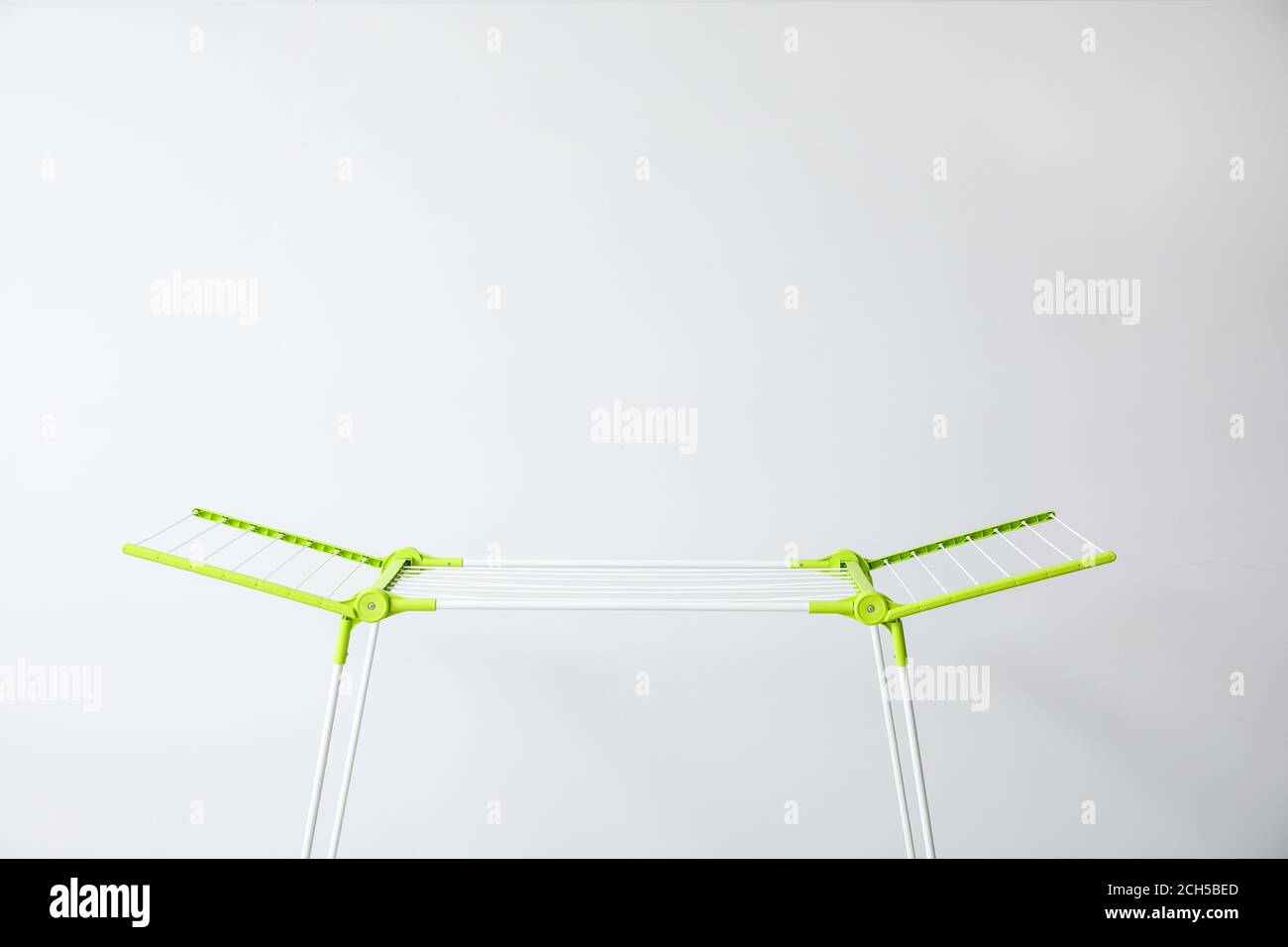 Empty clothes drying stand hi-res stock photography and images - Alamy