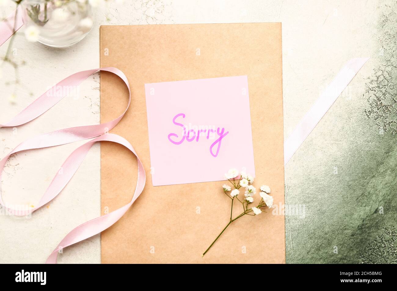 Letter with word SORRY on color background Stock Photo - Alamy