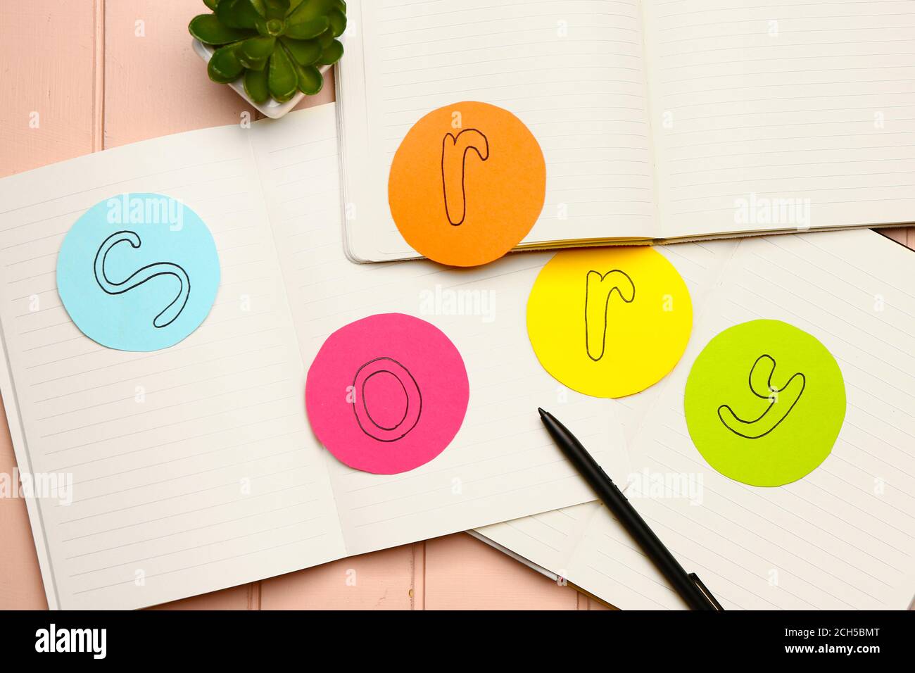 Sorry word written on paper hi-res stock photography and images - Alamy