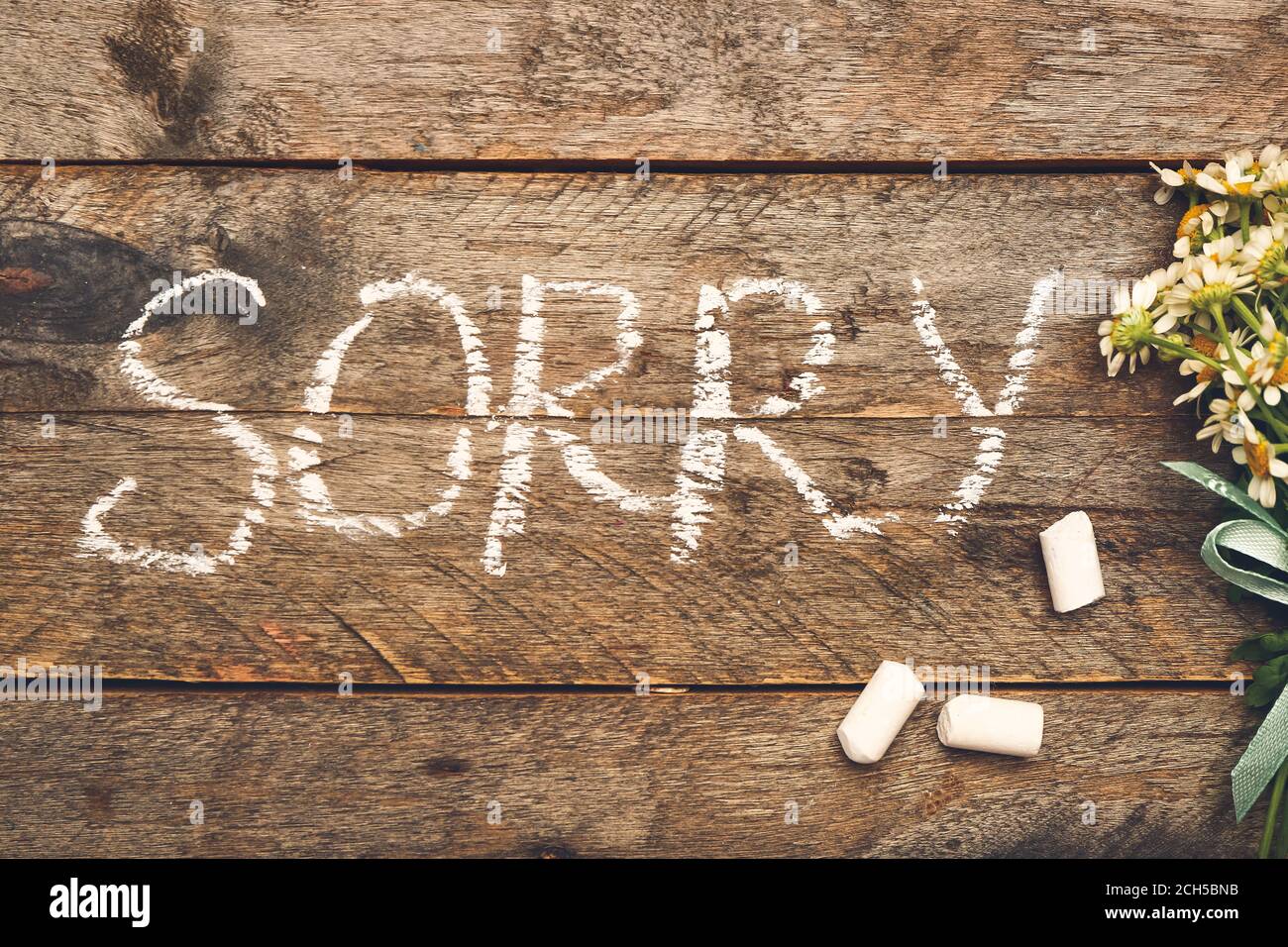 Word SORRY written on wooden background Stock Photo - Alamy