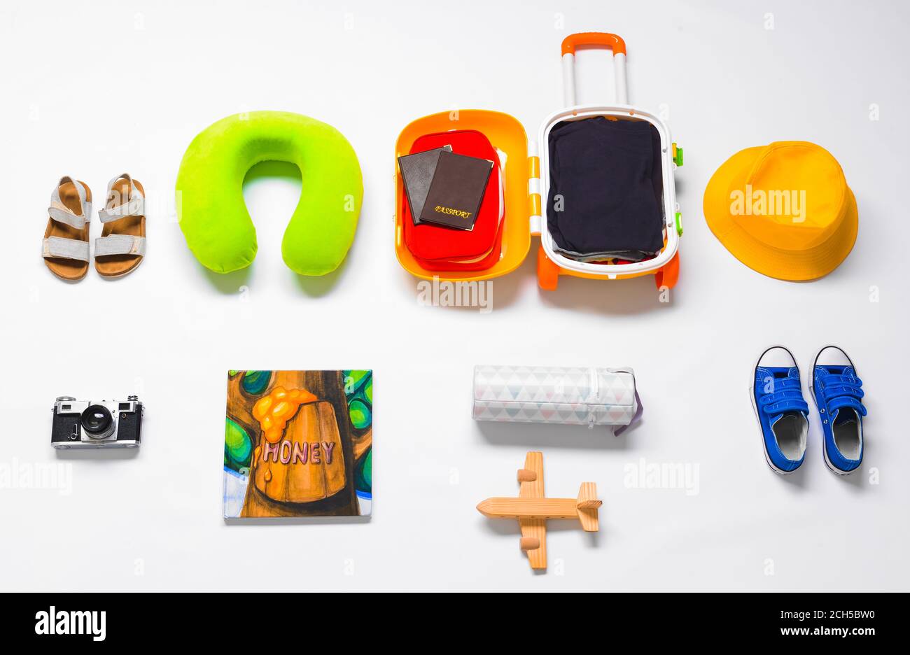 Travel accessories for children on white background Stock Photo - Alamy