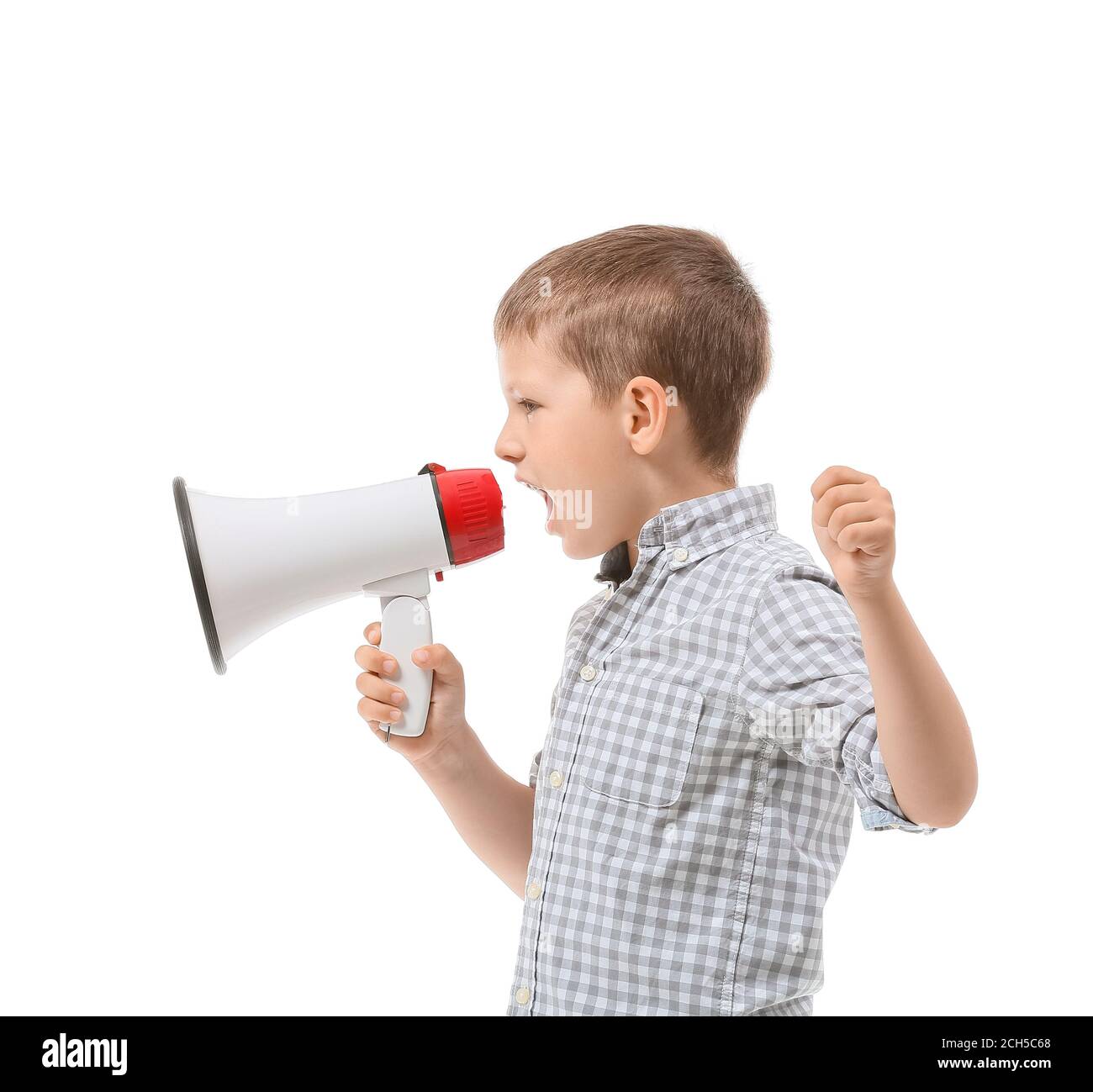 Aggressive little boy with megaphone on white background Stock Photo ...