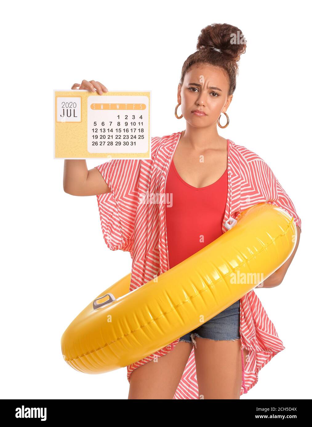 Sad woman with calendar and inflatable ring on white background ...