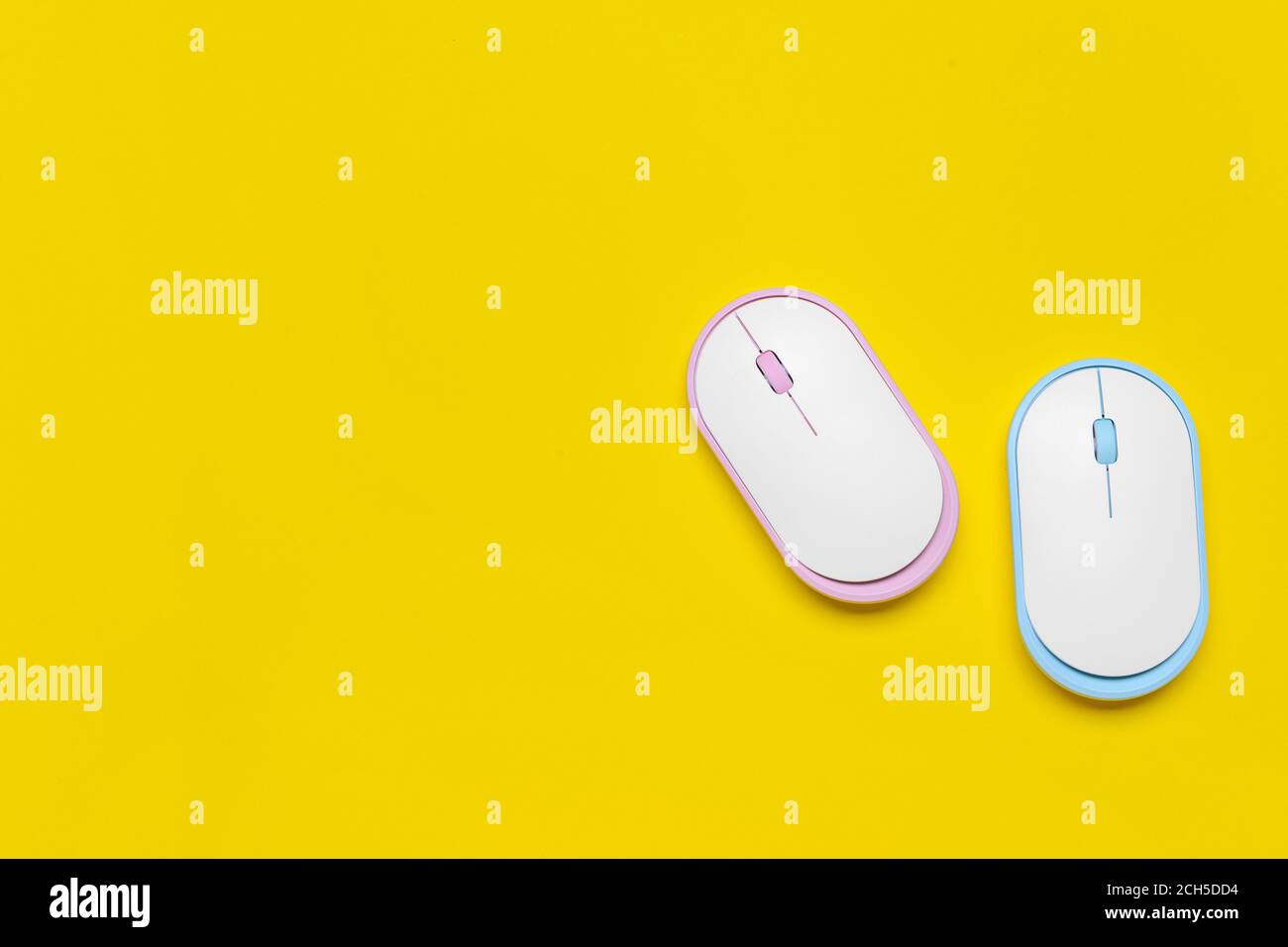 Modern computer mouse devices on color background Stock Photo - Alamy