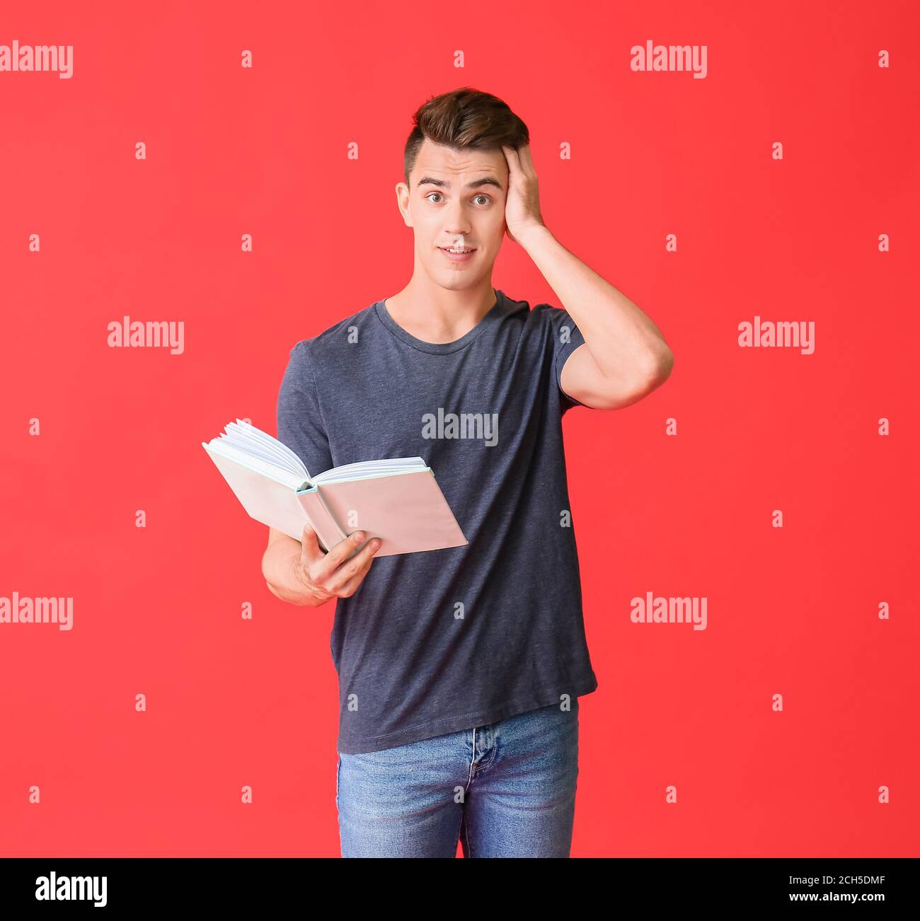 Confused man reading book hi-res stock photography and images - Alamy