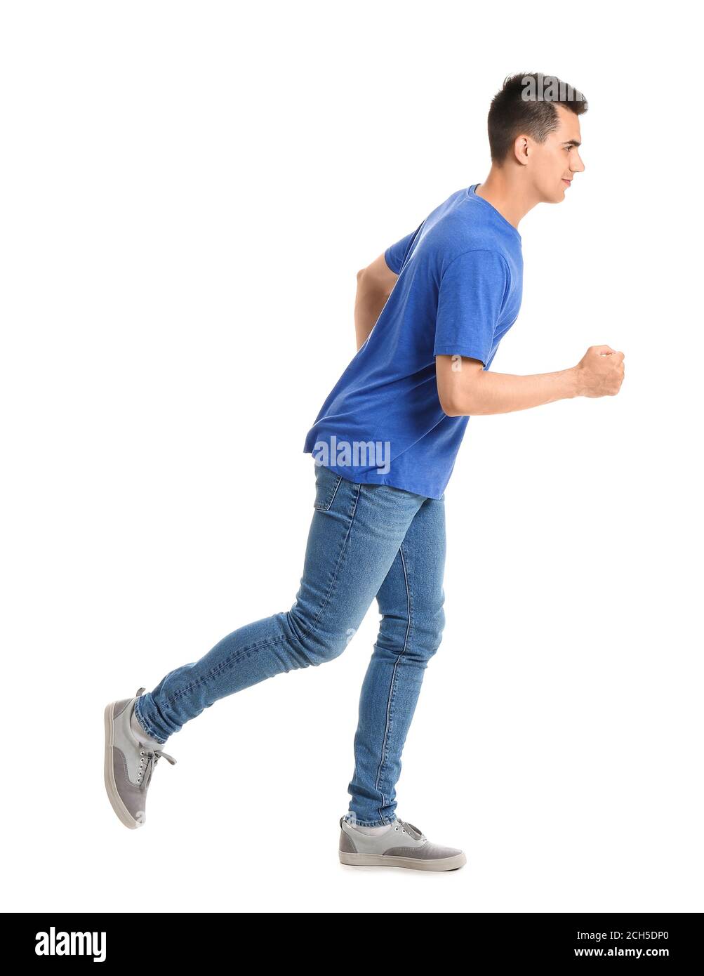 Going young man on white background Stock Photo - Alamy