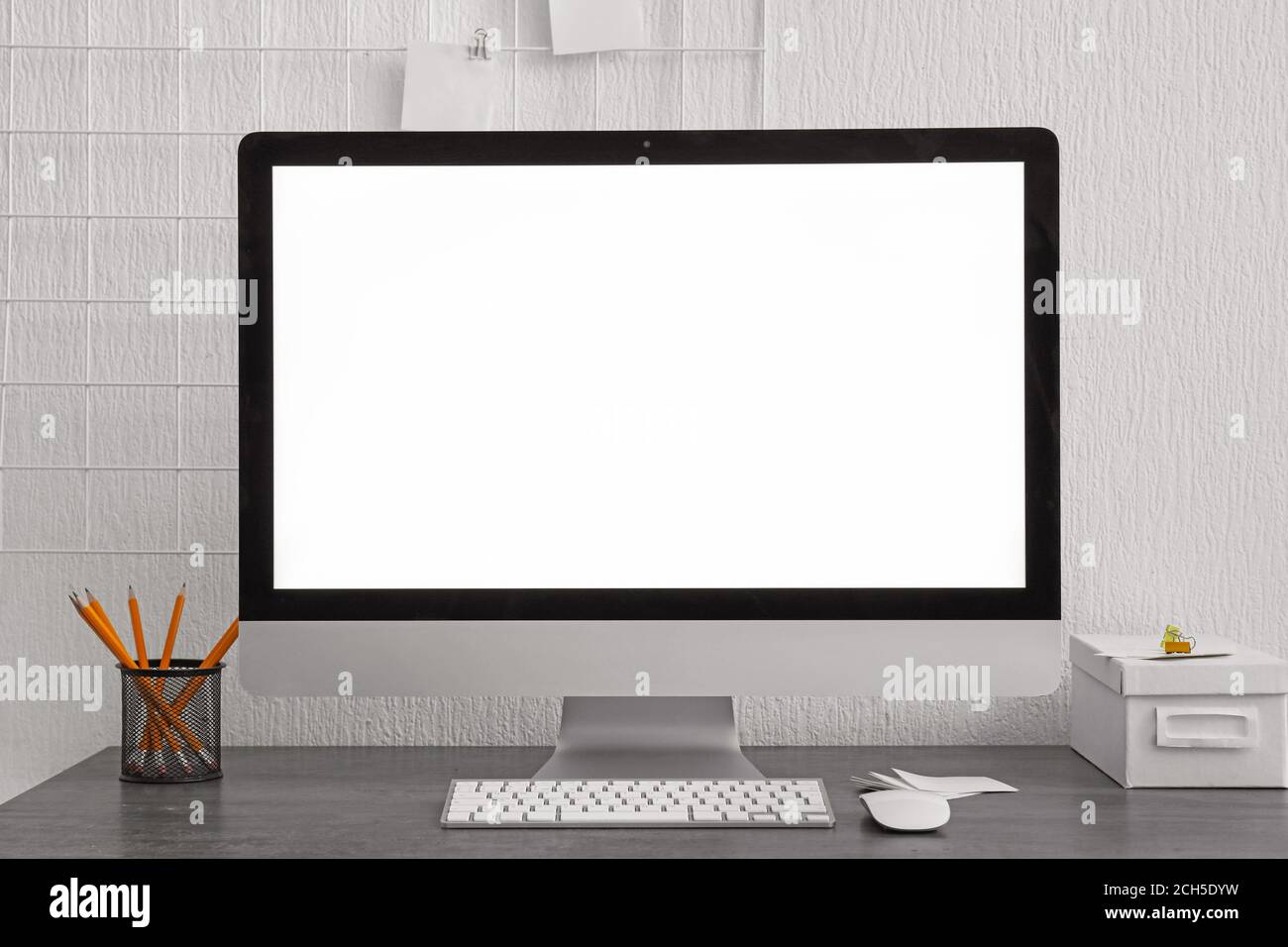 Modern PC monitor with blank screen on table Stock Photo - Alamy