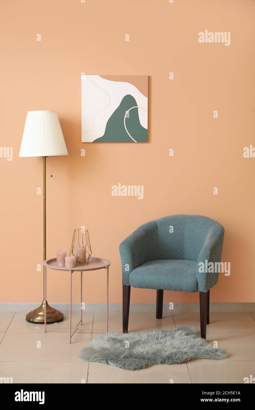 Interior of room with comfortable armchair Stock Photo - Alamy