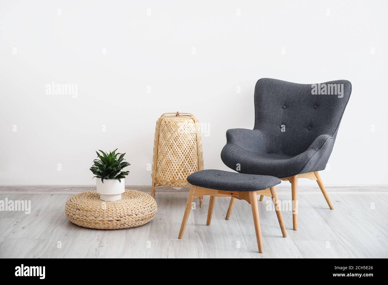 Interior of room with comfortable armchair Stock Photo - Alamy
