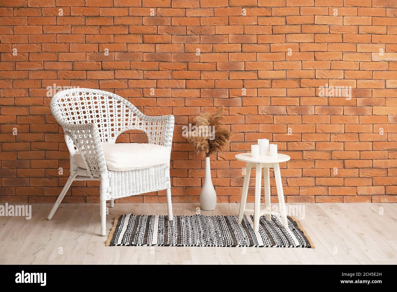 Interior of room with comfortable armchair Stock Photo - Alamy