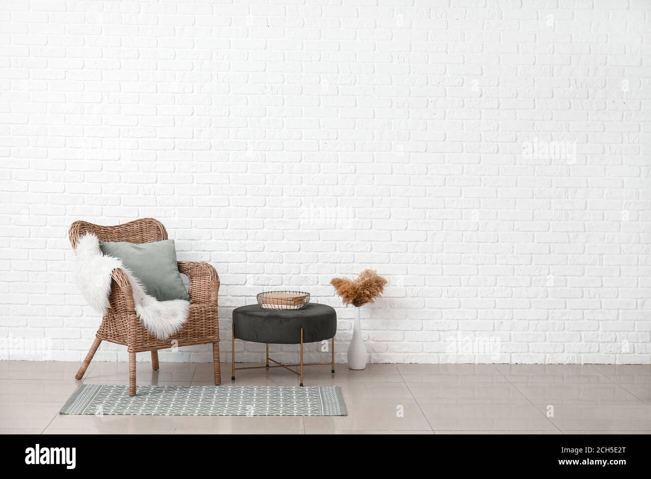 Interior of room with stylish armchair Stock Photo - Alamy