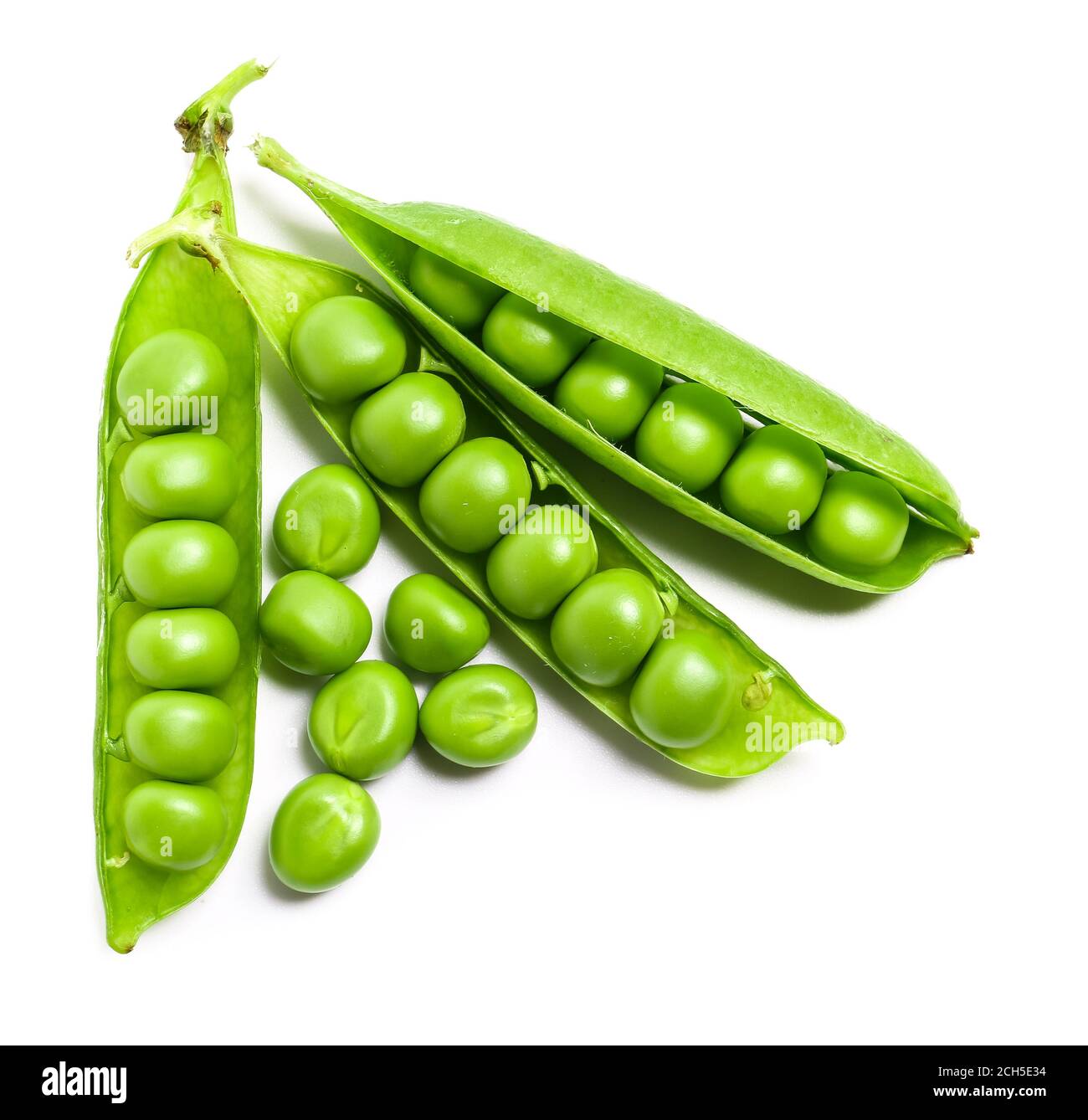 Tasty fresh peas on white background Stock Photo - Alamy