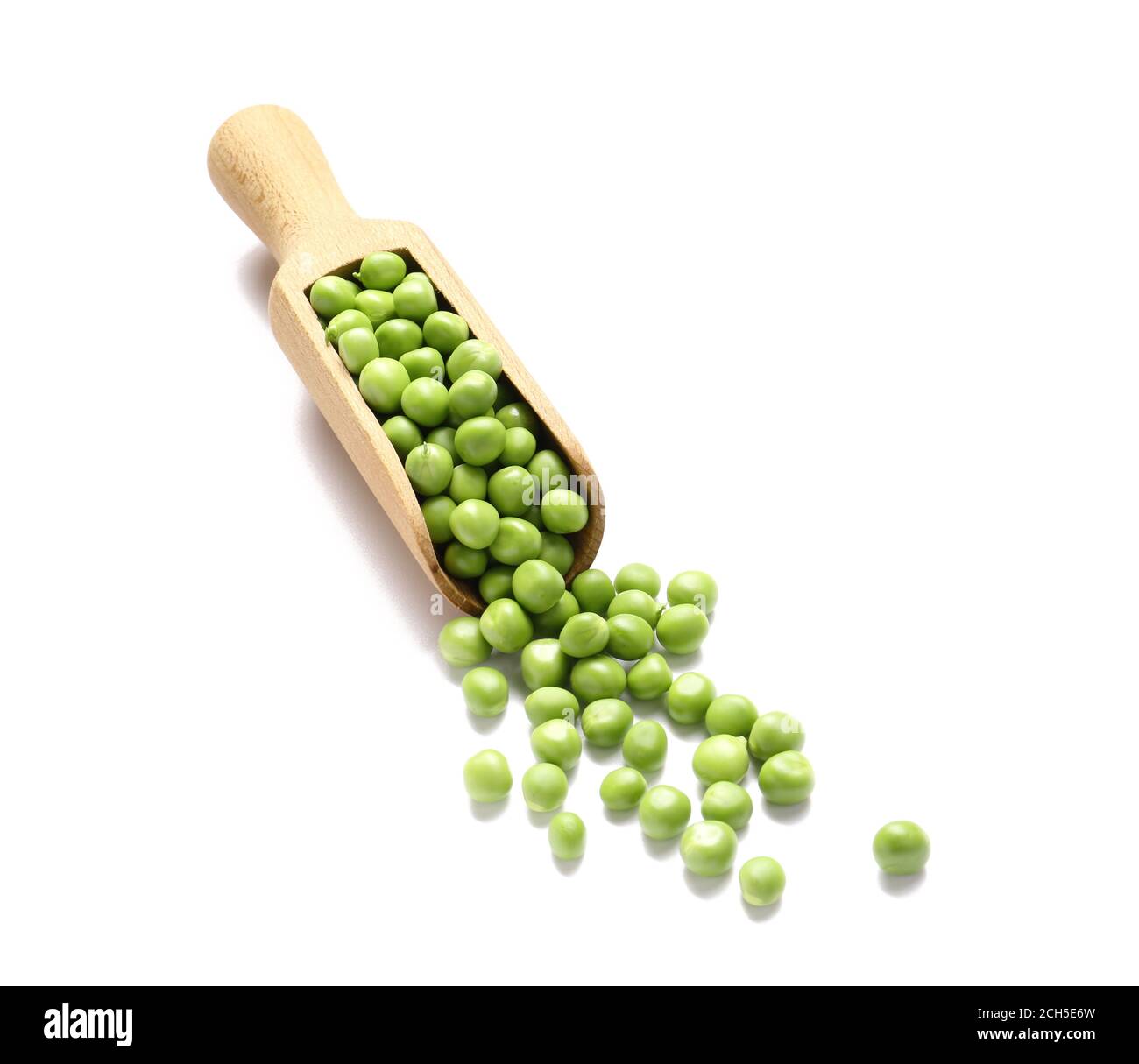 Scoop with tasty fresh peas on white background Stock Photo - Alamy