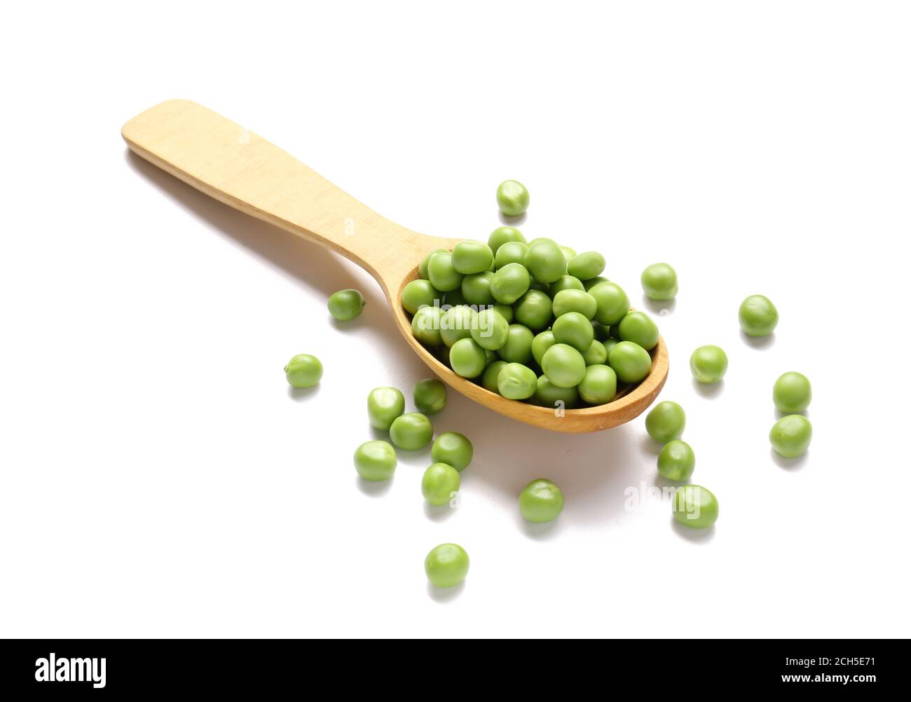 Spoon with tasty fresh peas on white background Stock Photo - Alamy