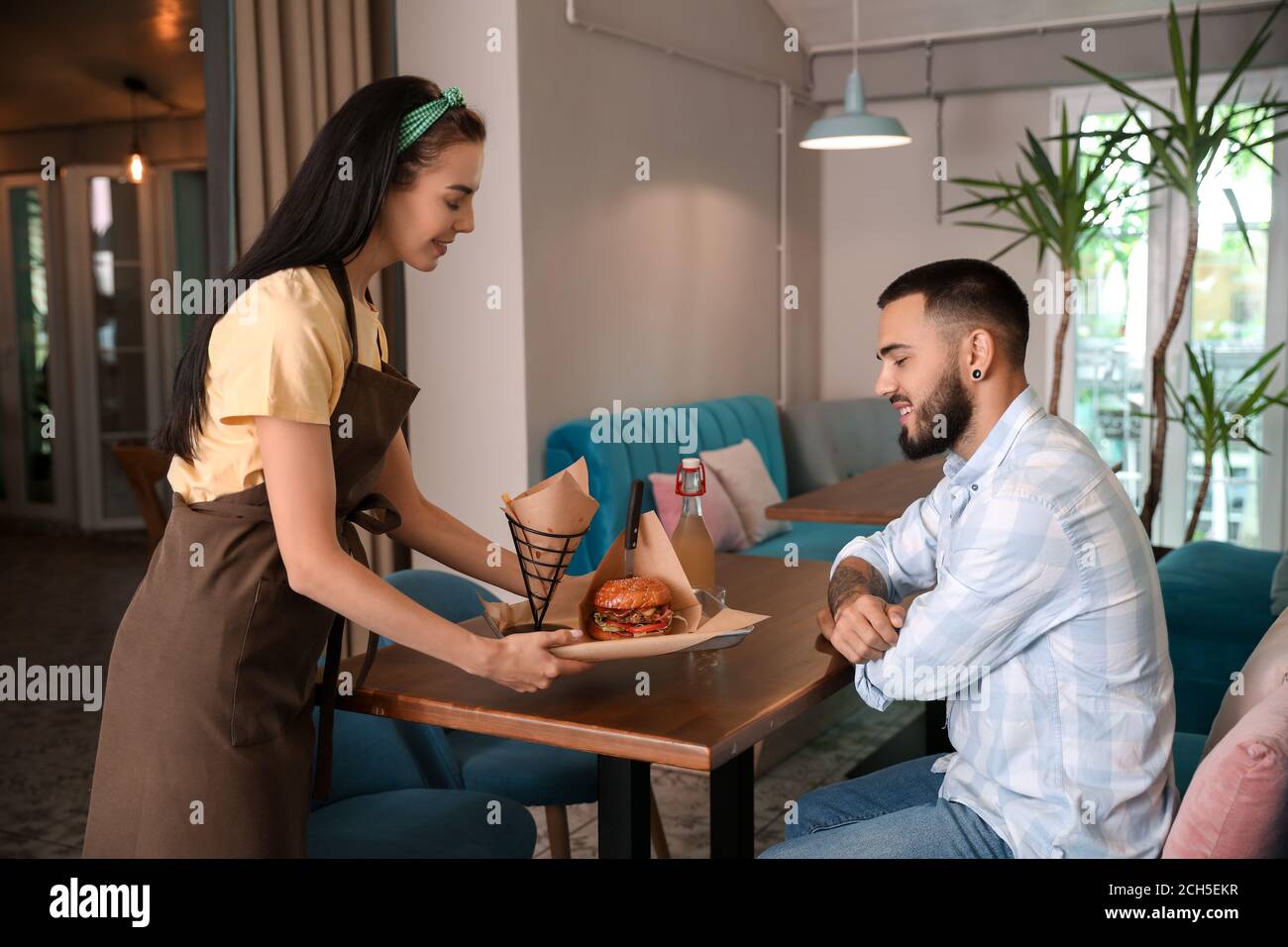 Caucasian waitress burger hi-res stock photography and images - Alamy
