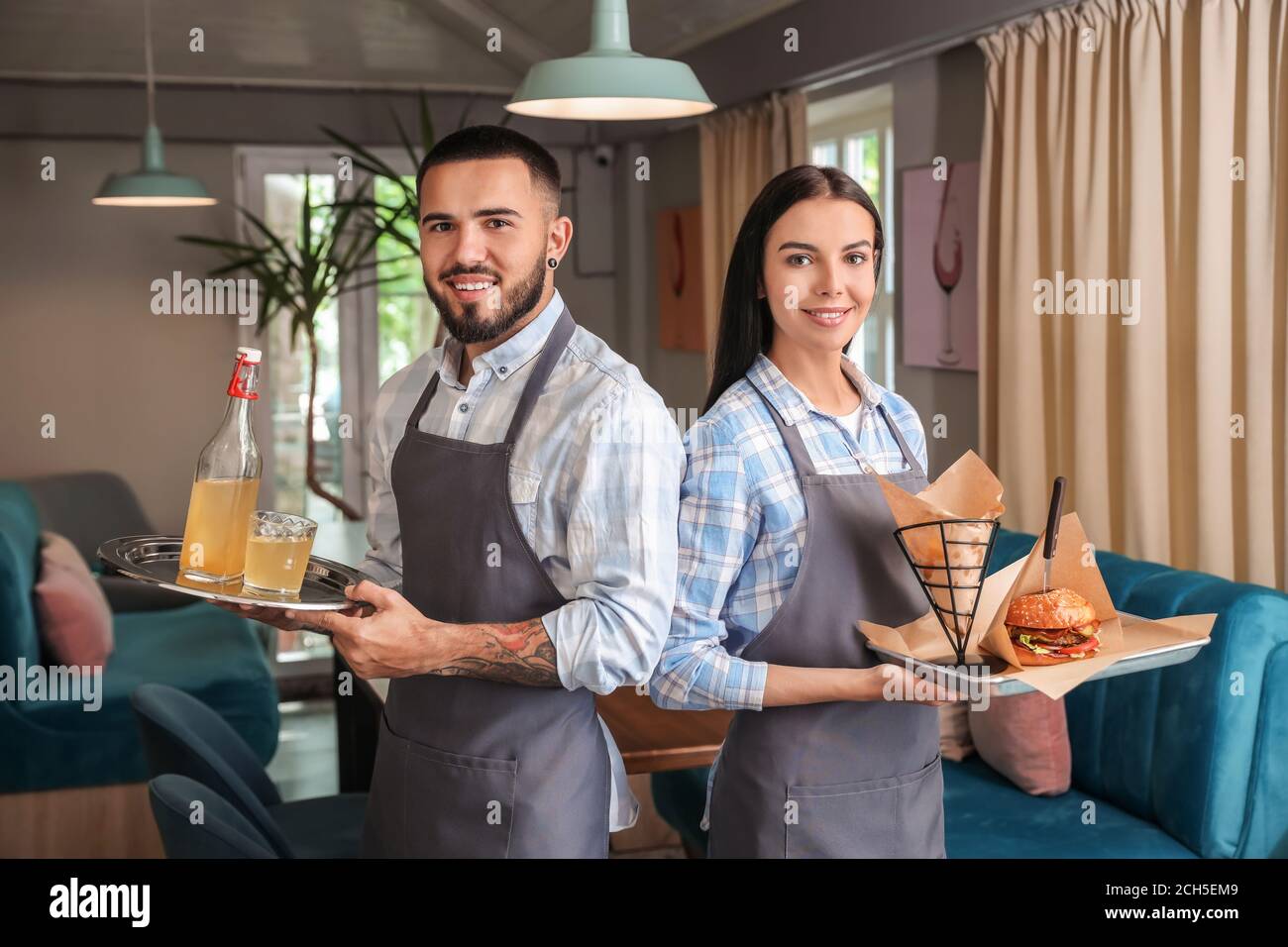 Waitress food trays hi-res stock photography and images - Alamy