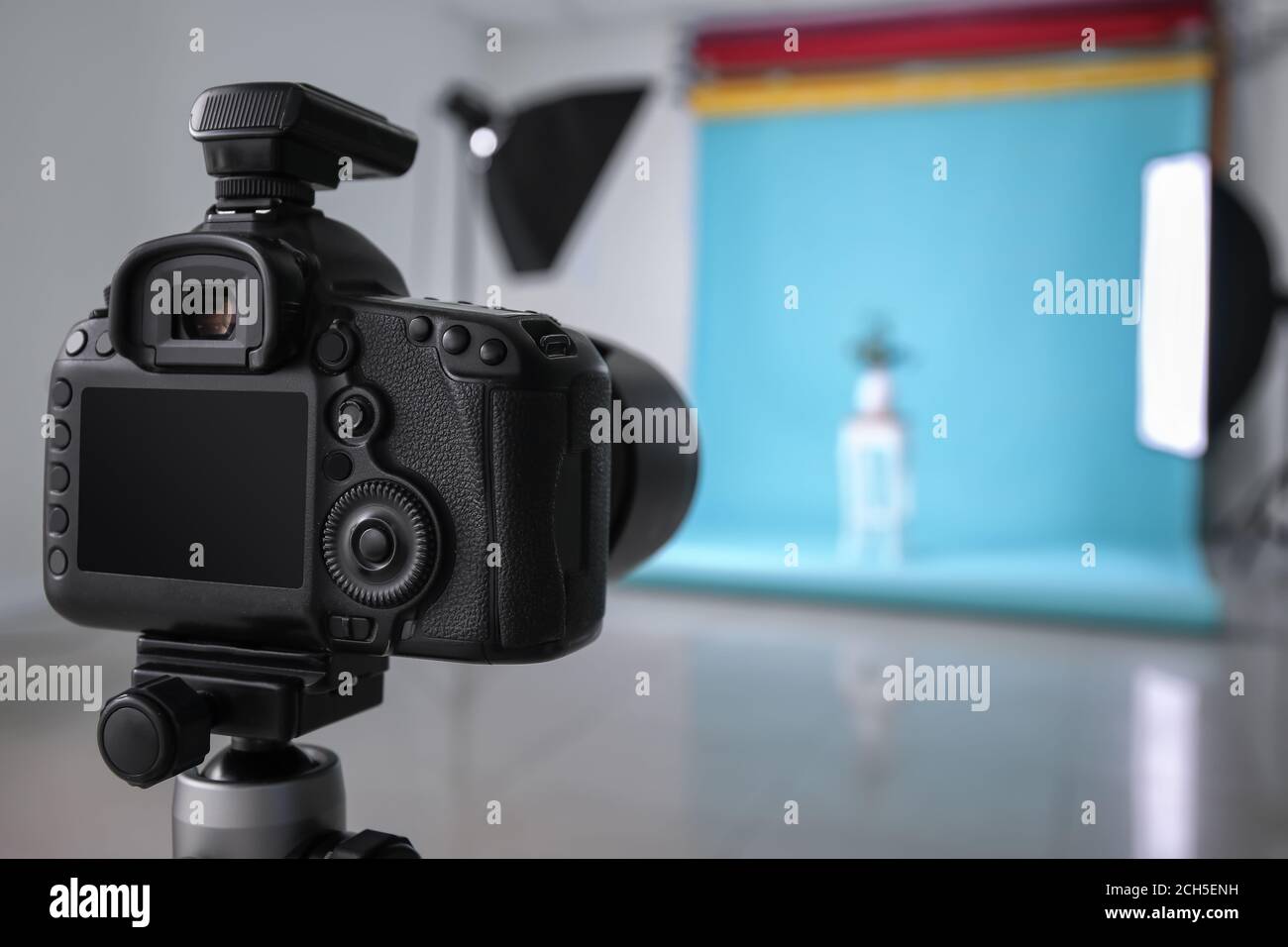 Modern photo camera in studio Stock Photo - Alamy