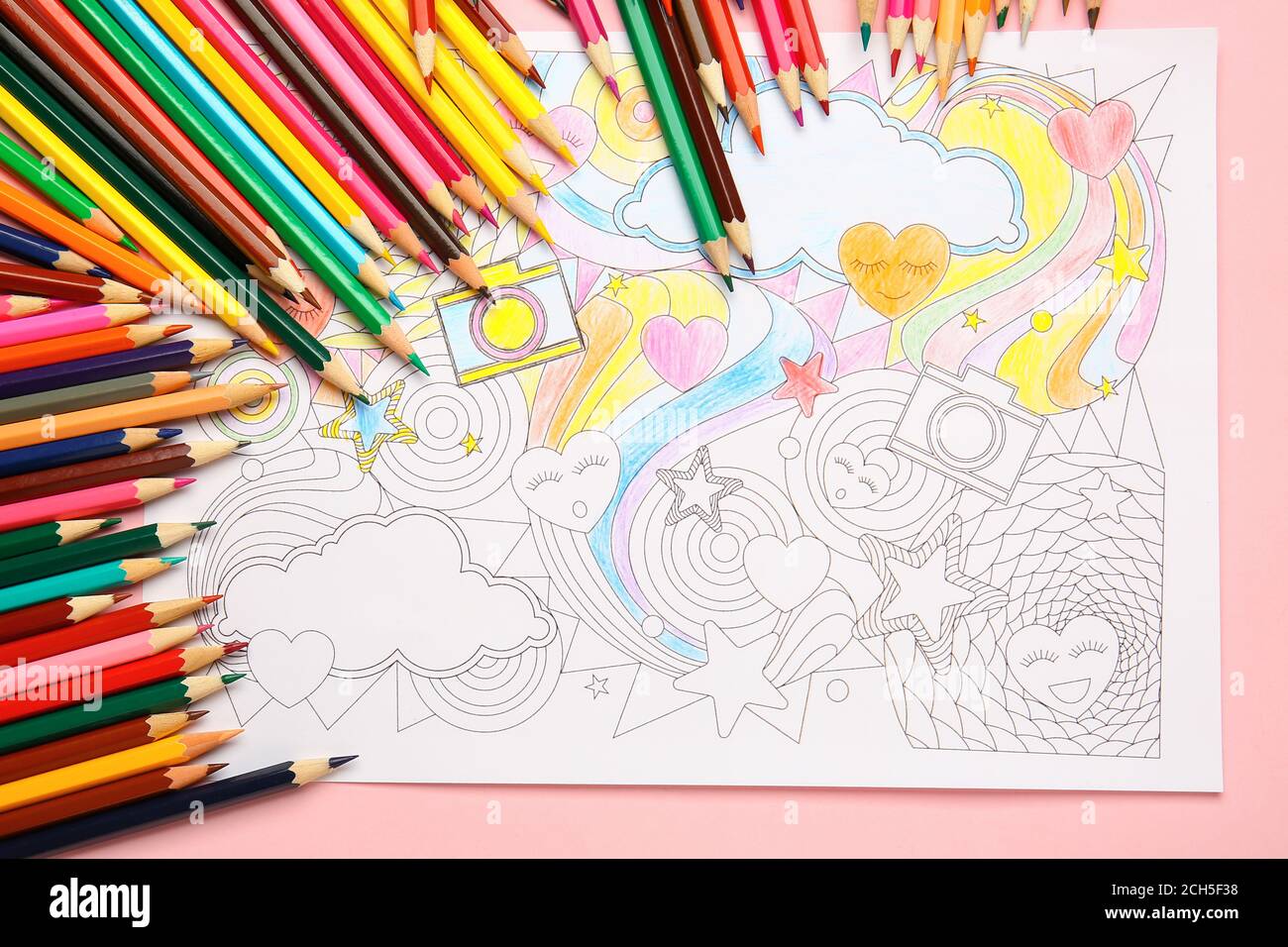 Coloring picture and pencils on color background Stock Photo - Alamy