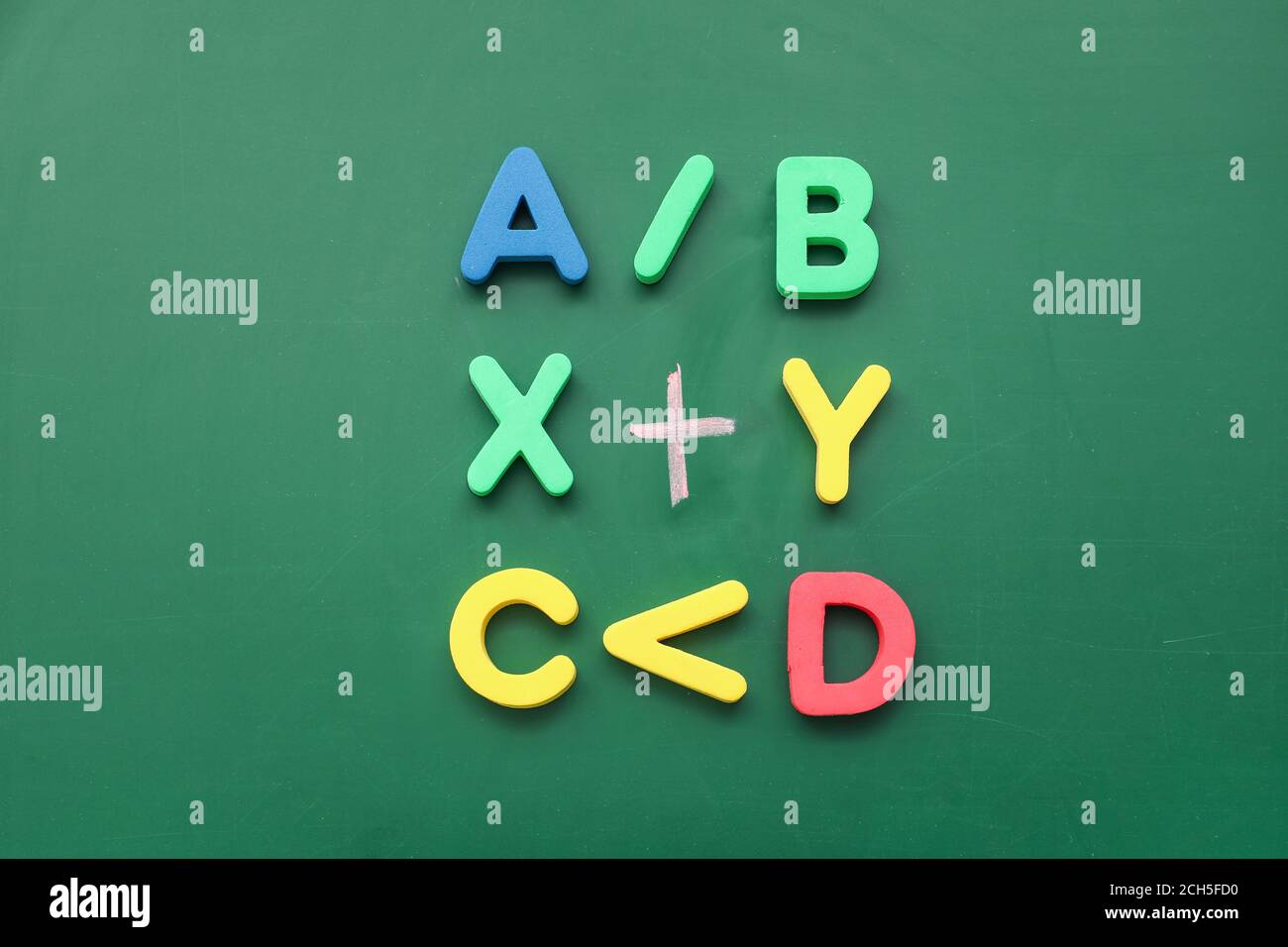 Letters and mathematical signs on color background Stock Photo - Alamy