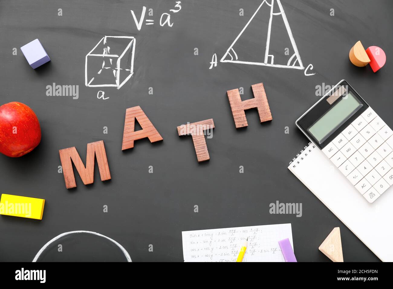 Word MATH and stationery on school blackboard Stock Photo - Alamy