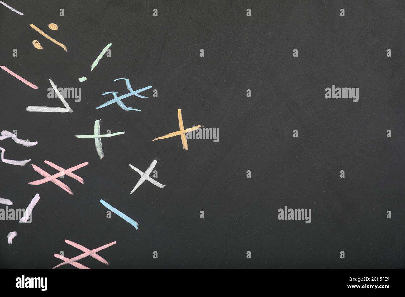 Mathematical symbols written on blackboard Stock Photo - Alamy