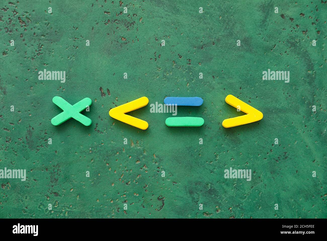 Mathematical symbols on color background Stock Photo - Alamy