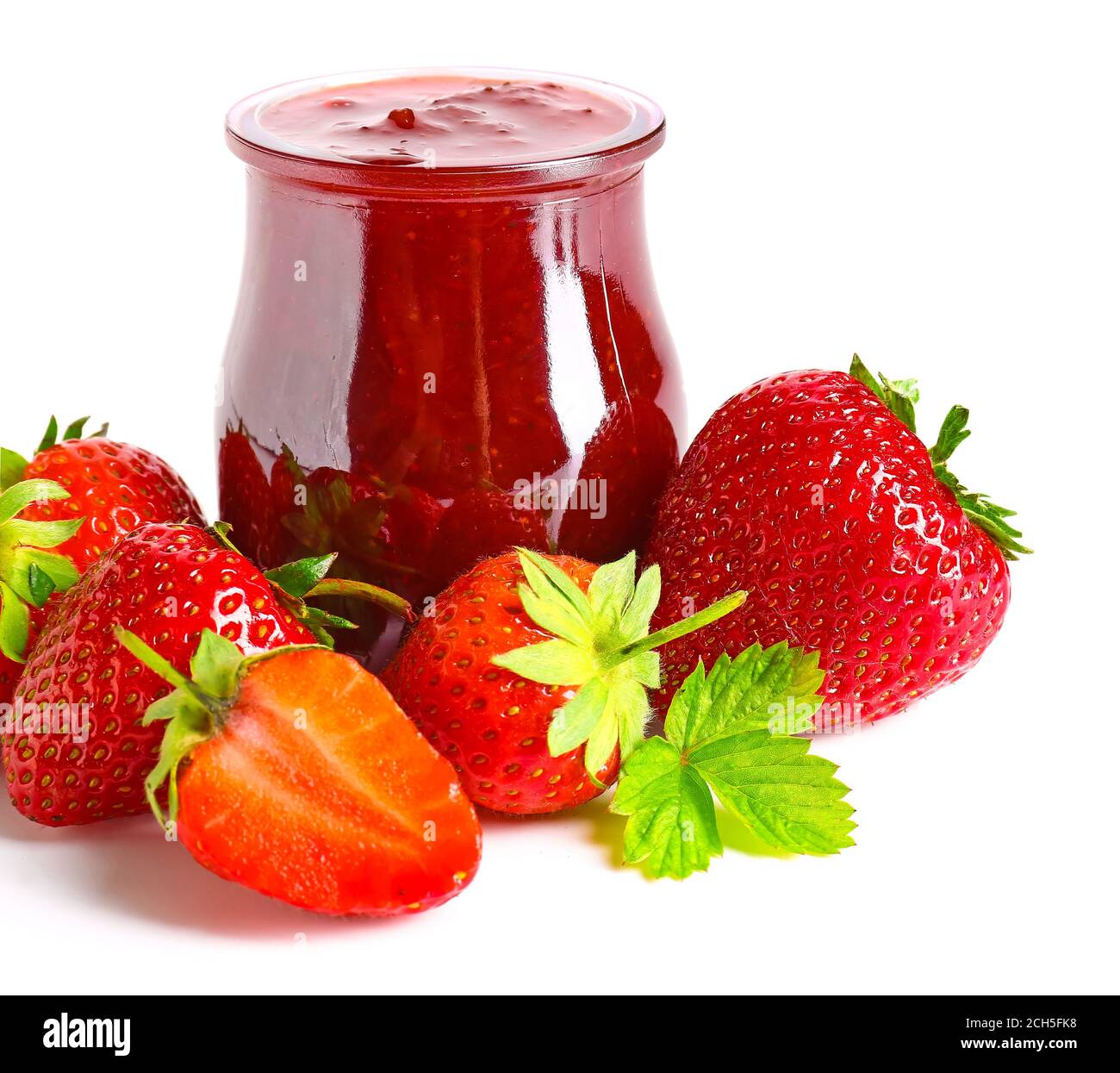 Jar of tasty strawberry jam on white background Stock Photo - Alamy