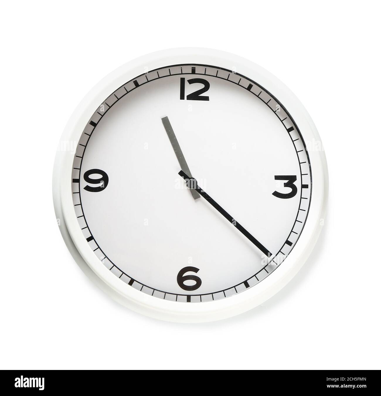 Simple clock on white background Stock Photo - Alamy