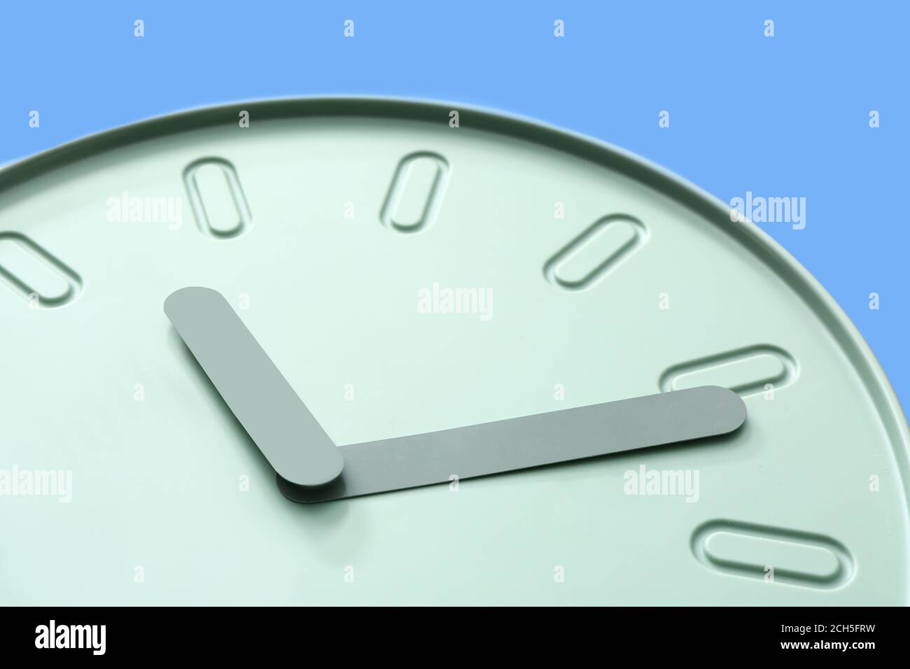 Simple clock on color background, closeup Stock Photo - Alamy