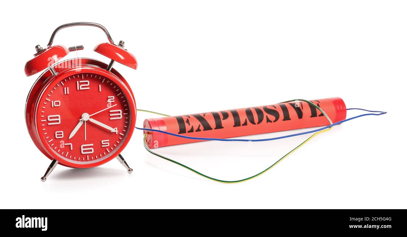 Dynamite with alarm clock on white background Stock Photo - Alamy