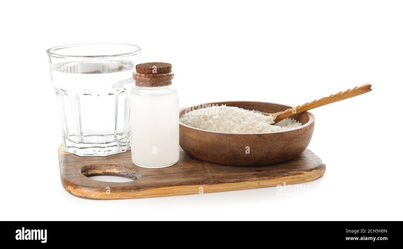 Healthy rice water on white background Stock Photo - Alamy