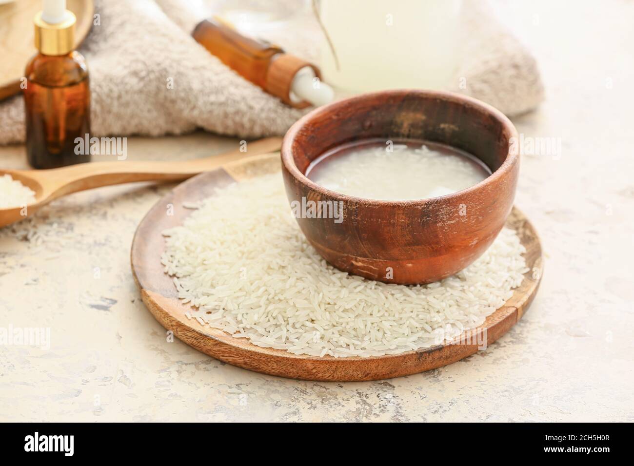 Healthy rice water on light background Stock Photo - Alamy