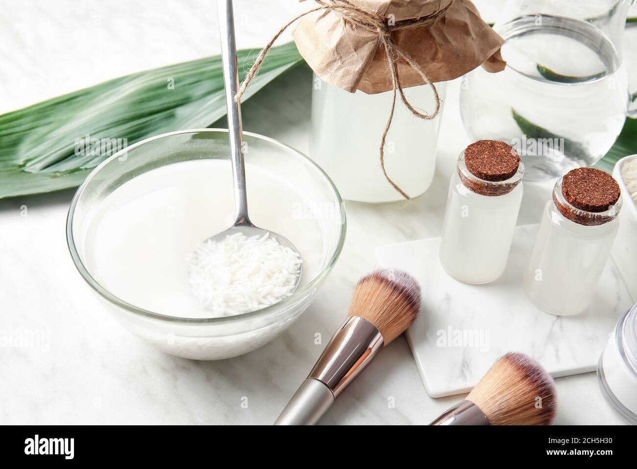 Healthy rice water on white background Stock Photo - Alamy