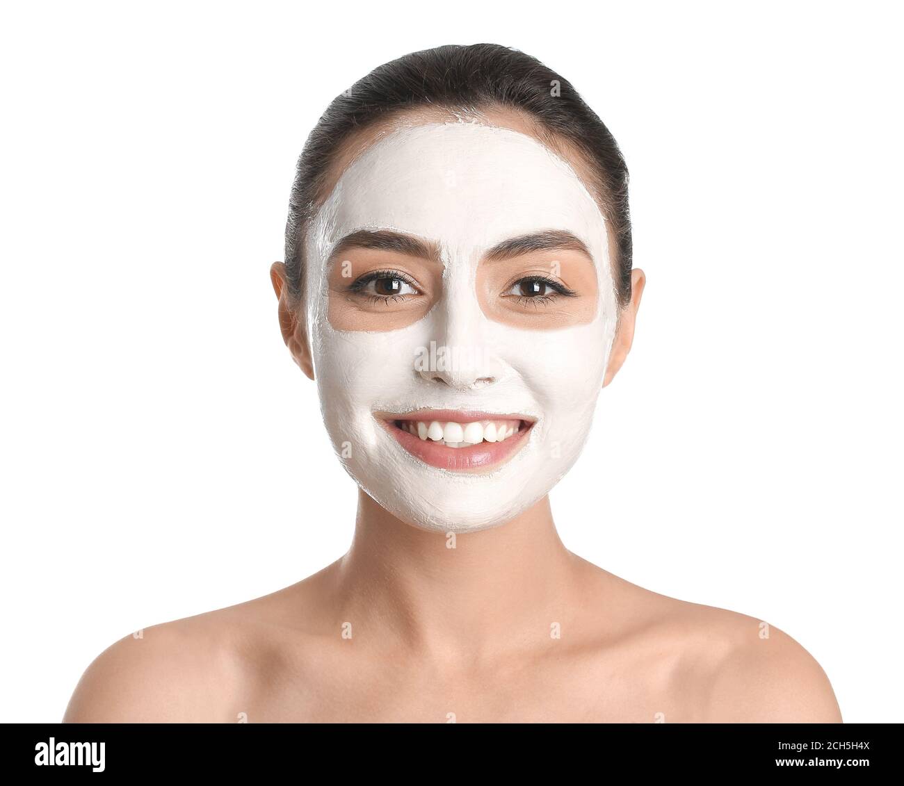 Beautiful young woman with mask on her face against white background ...