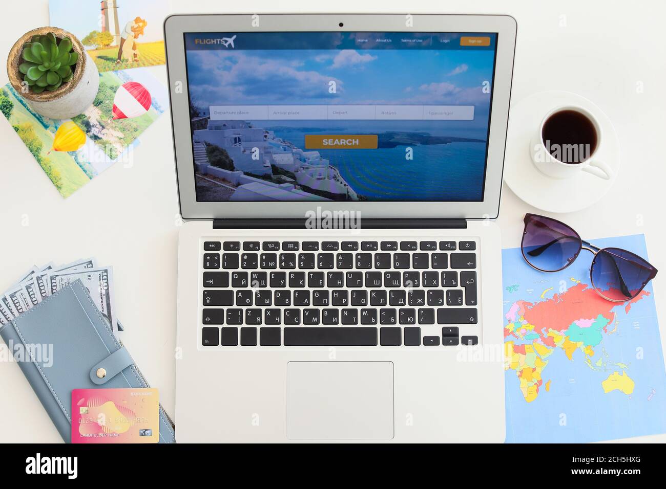 Open page of online booking service on screen of laptop on table Stock ...