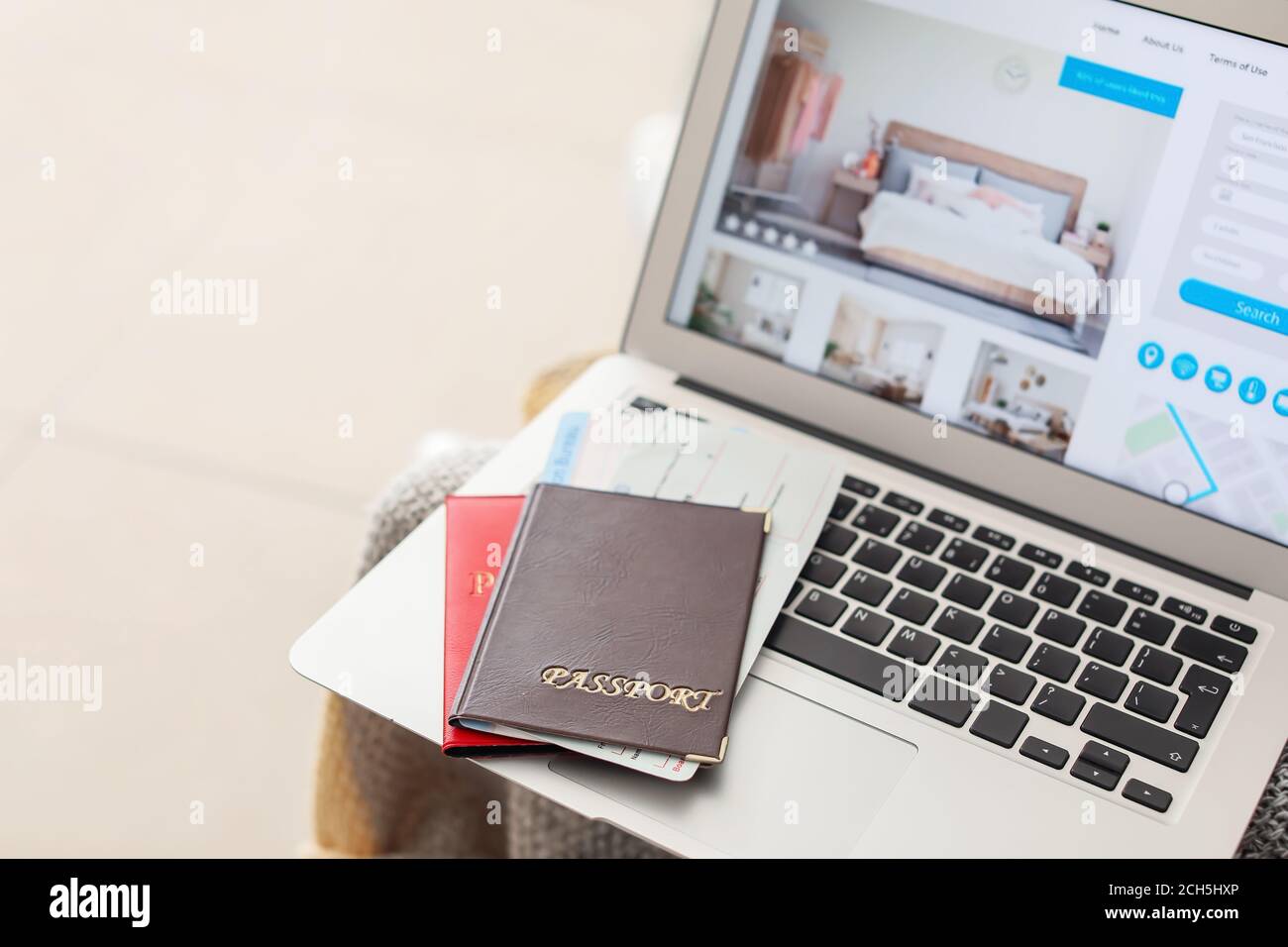 Open page of online booking service on screen of laptop Stock Photo - Alamy