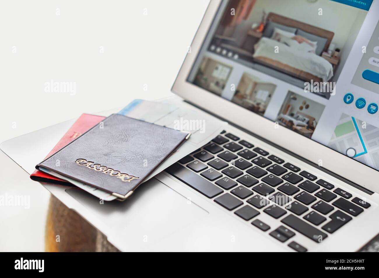 Open page of online booking service on screen of laptop Stock Photo - Alamy