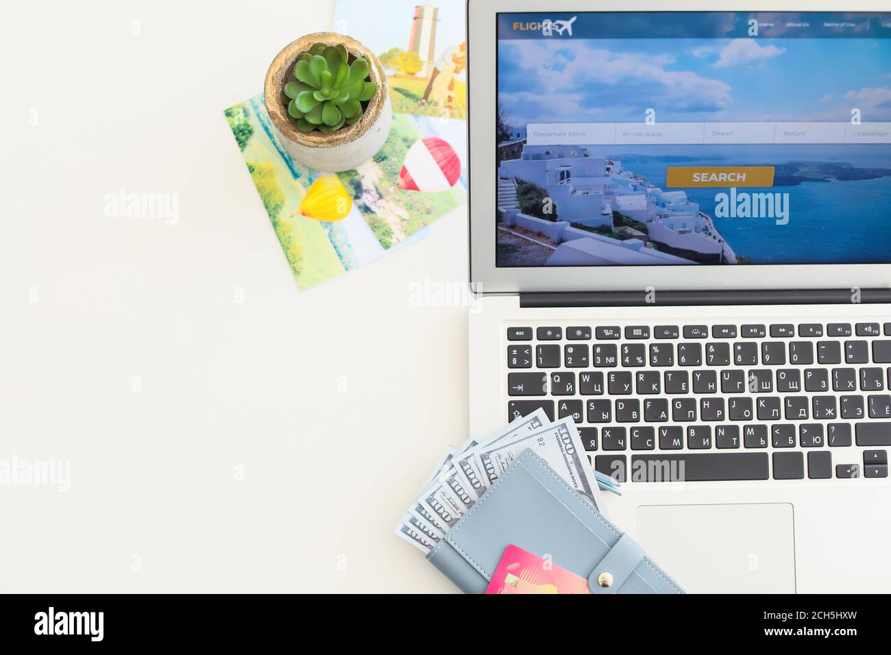 Open page of online booking service on screen of laptop on table Stock ...