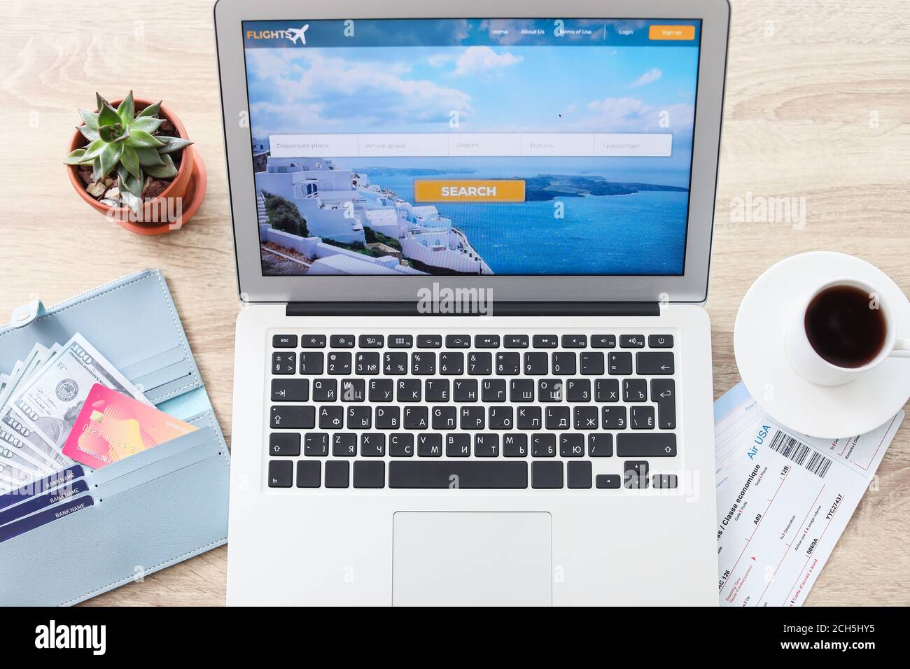 Open page of online booking service on screen of laptop on table Stock ...
