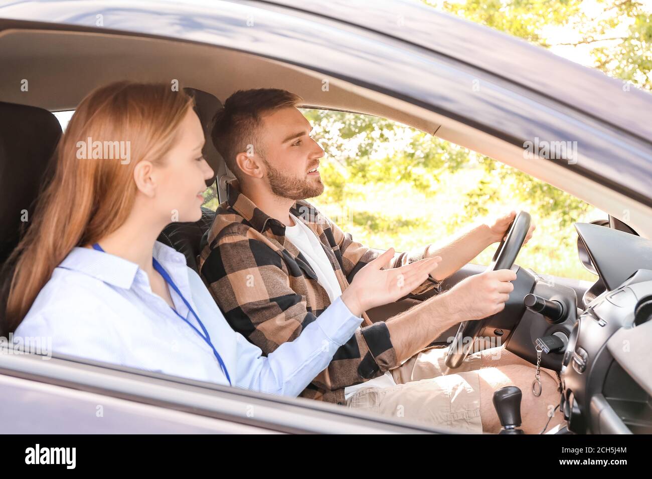 Instructor conducting driver licence test Stock Photo - Alamy