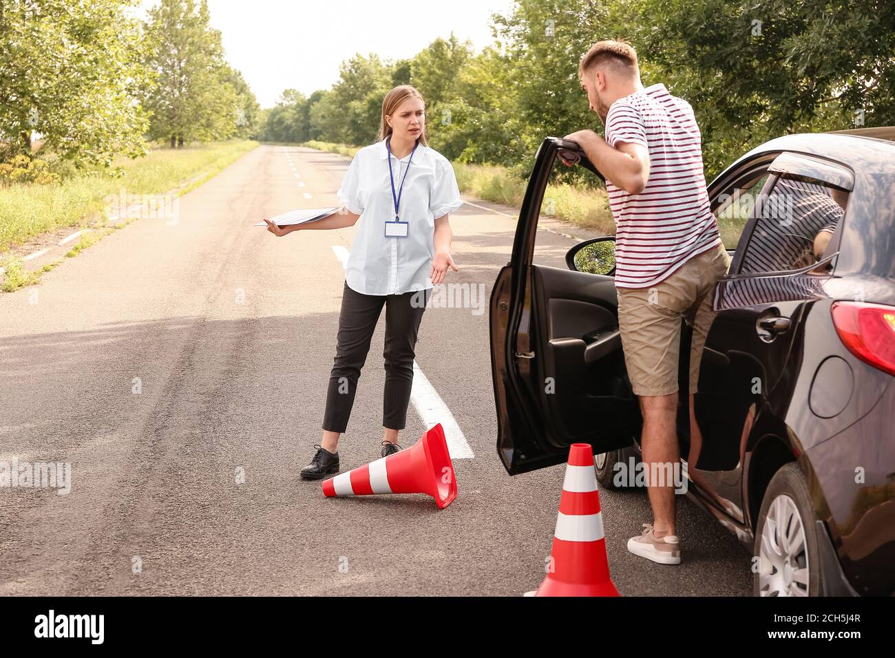 Instructor conducting driver licence test Stock Photo - Alamy